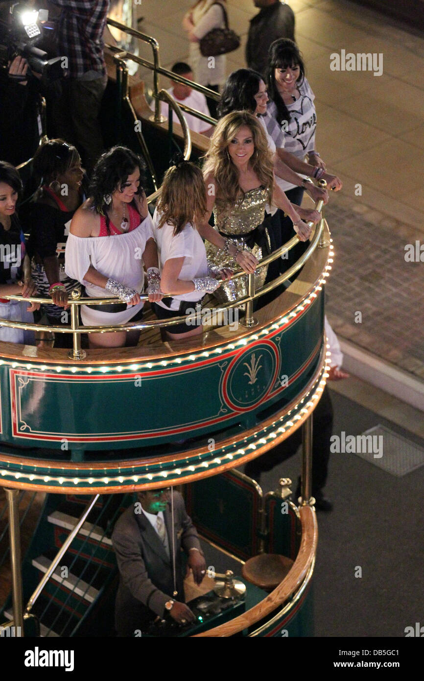 Jennifer Lopez rides into The Grove on a bus with her dancers ahead of ...