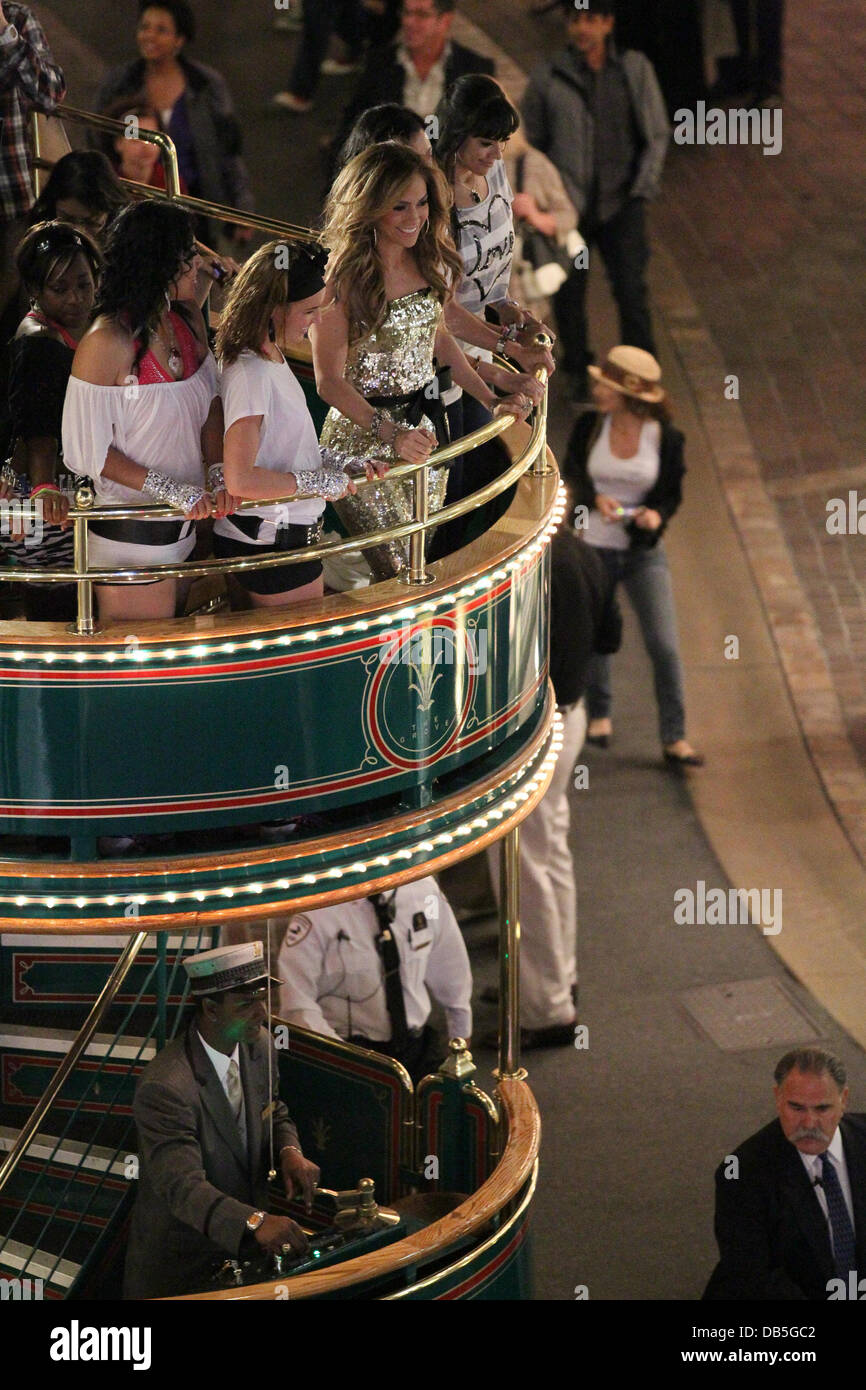 Jennifer Lopez rides into The Grove on a bus with her dancers ahead of ...