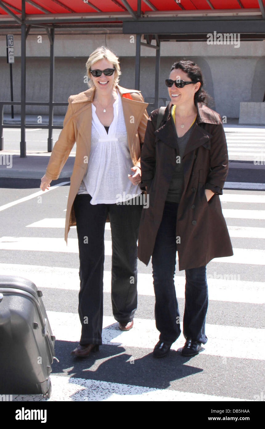 Jane Lynch and Dr. Lara Embry arriving at Washington Dulles Airport ...