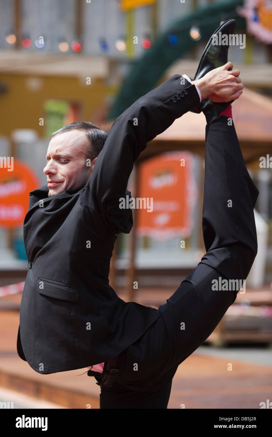 London, UK. 24 July 2013. Photo: Contortionist Jonathan Nosel of the ...
