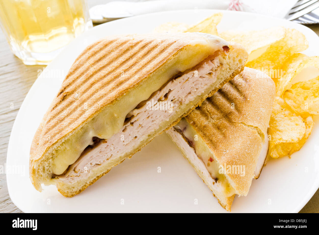 Lunch panini with chips on the side Stock Photo - Alamy