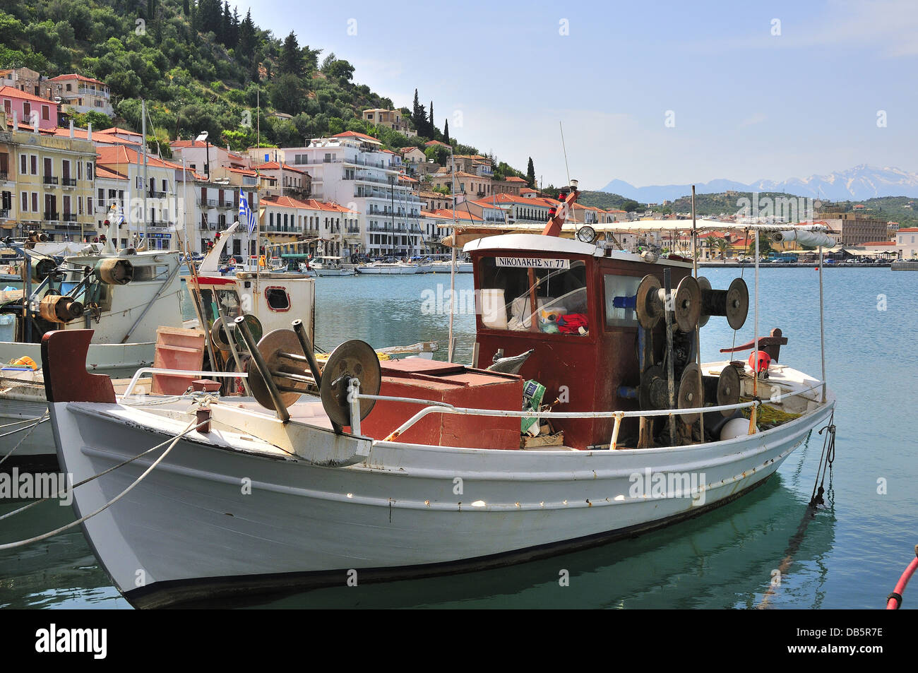Greek traditional fishing boat or caique in Gytheio Harbour ...