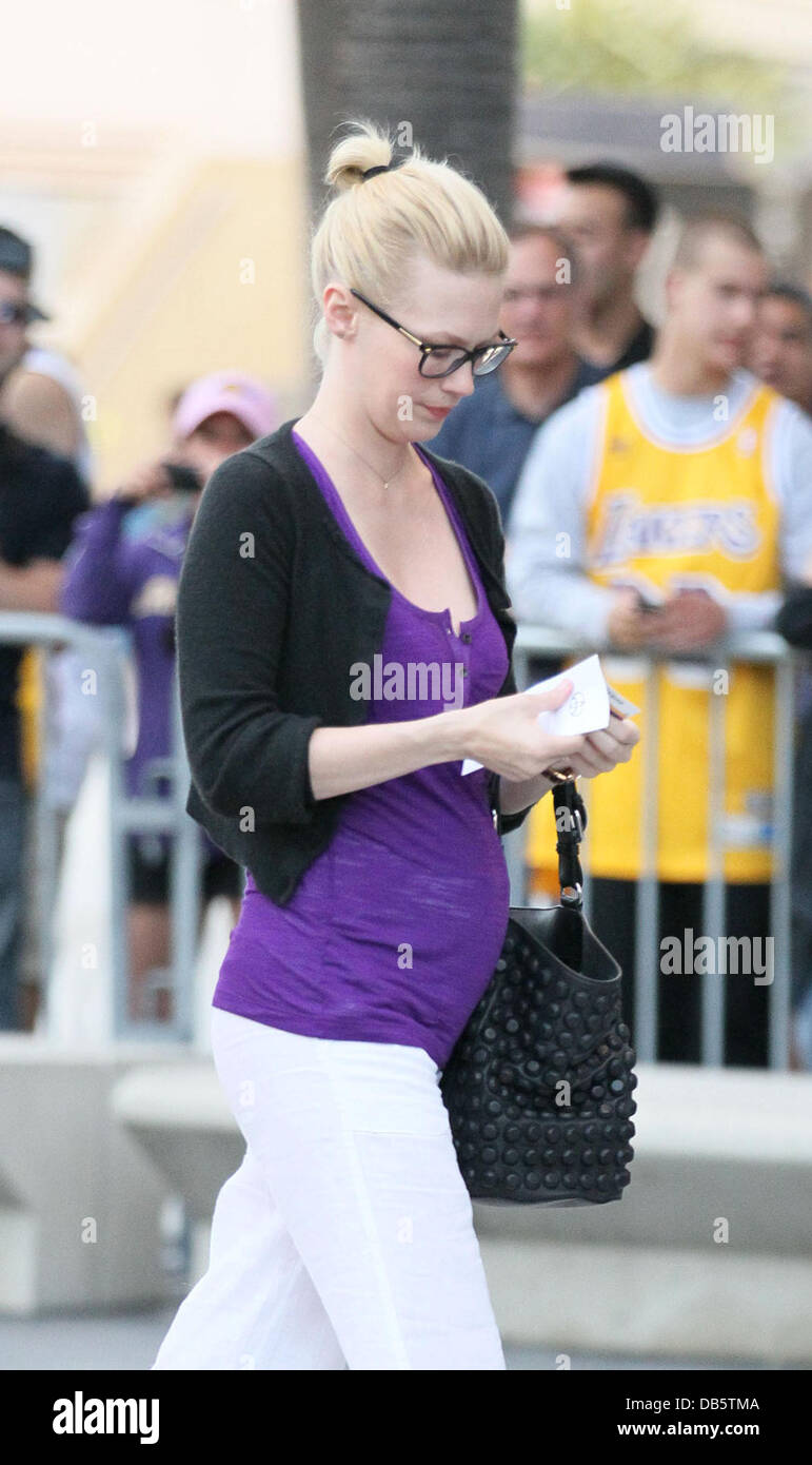 A pregnant January Jones Celebrities arrive at The Staples Center for ...