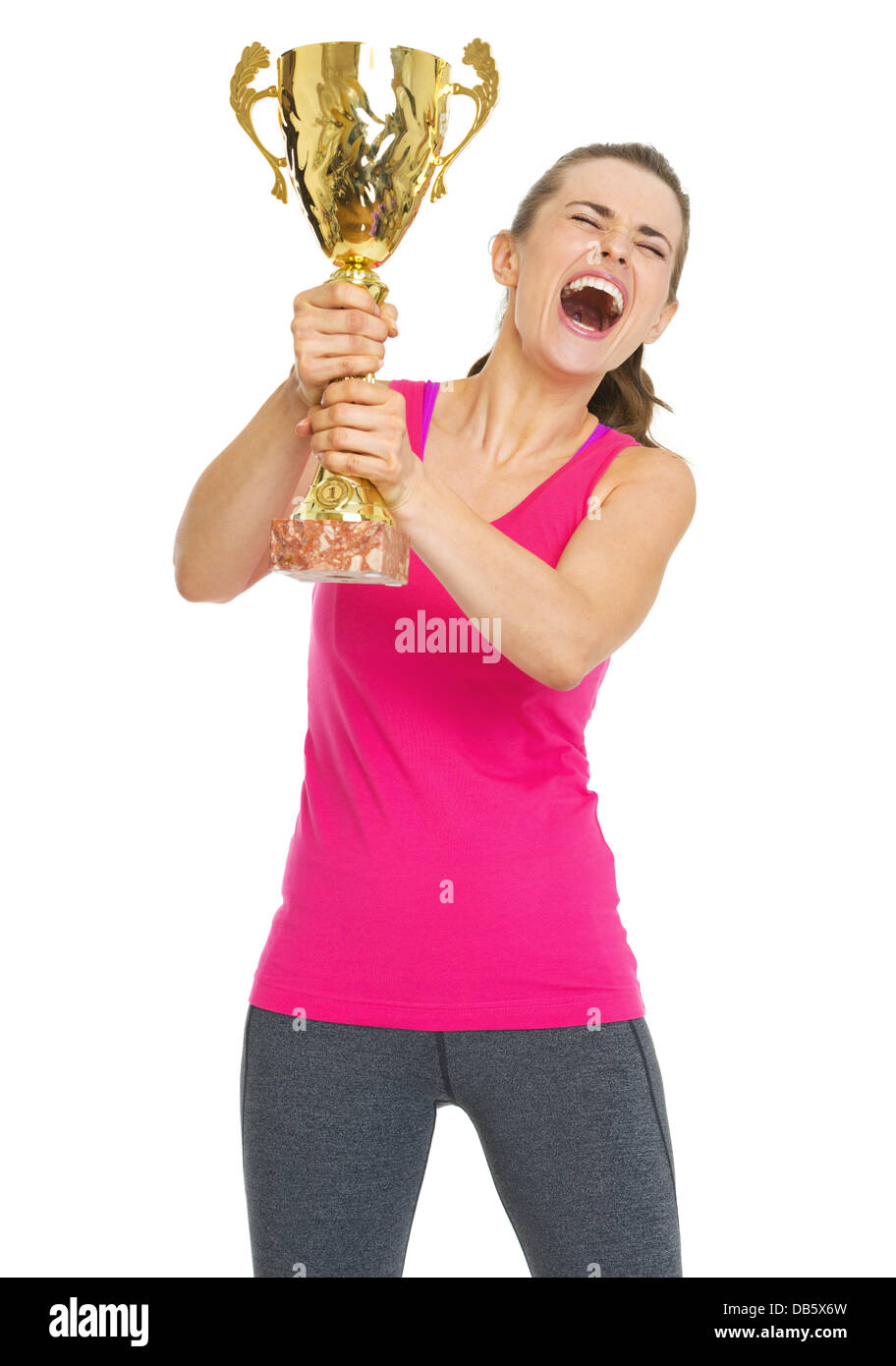 Happy female athlete holding trophy hi-res stock photography and images ...