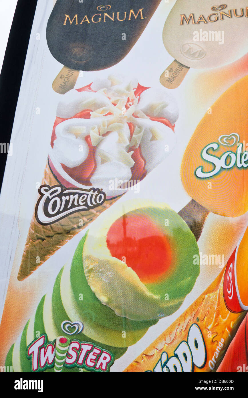 Ice cream advertising on a flag outside a seaside ice cream parlour ...