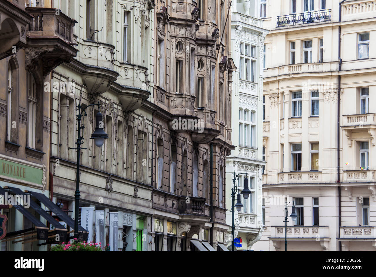 The facades of ornate buildings showing various architectural styles in ...