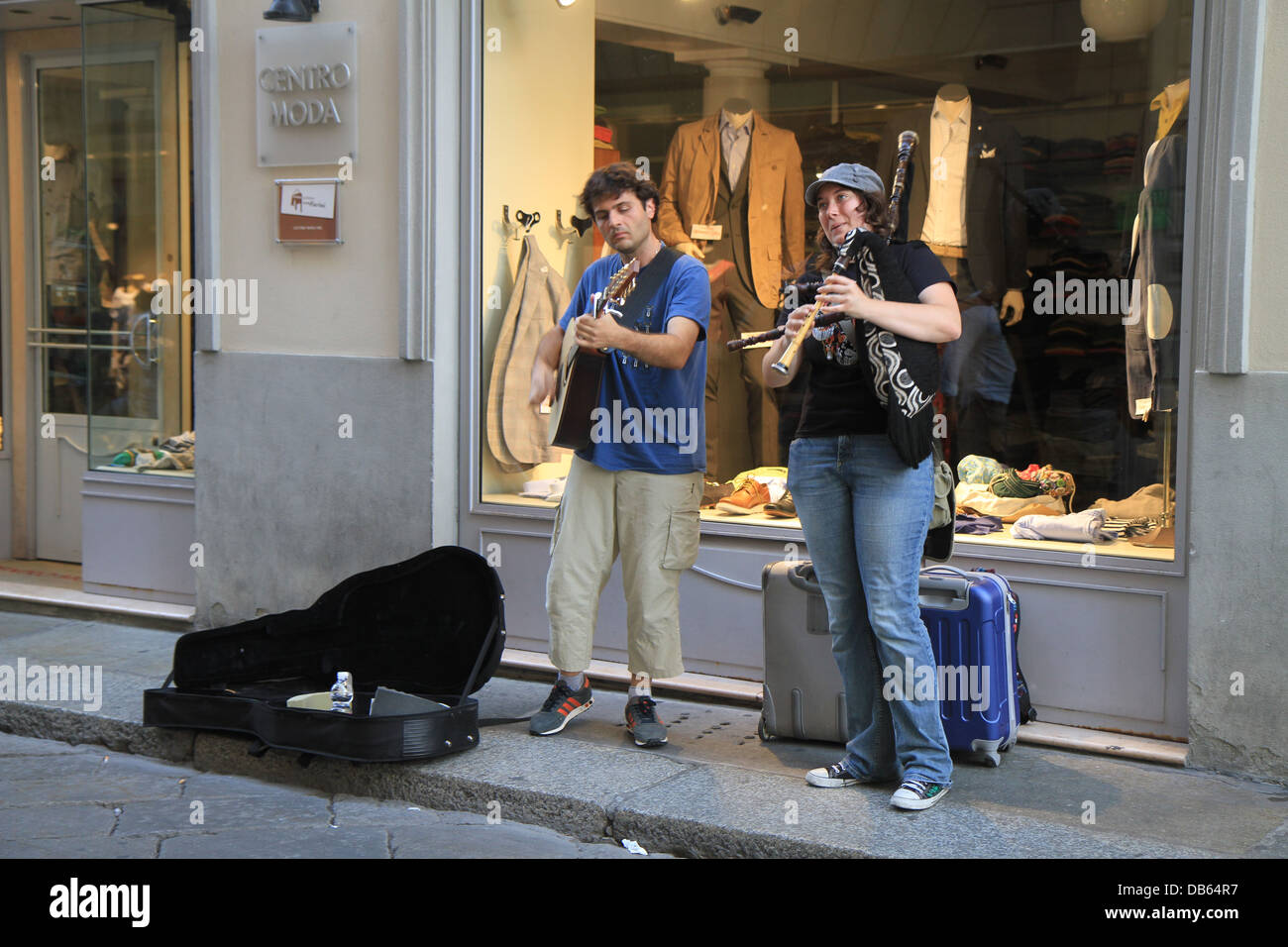 Young street musicians in Parma, Italy at via Farini Stock Photo - Alamy
