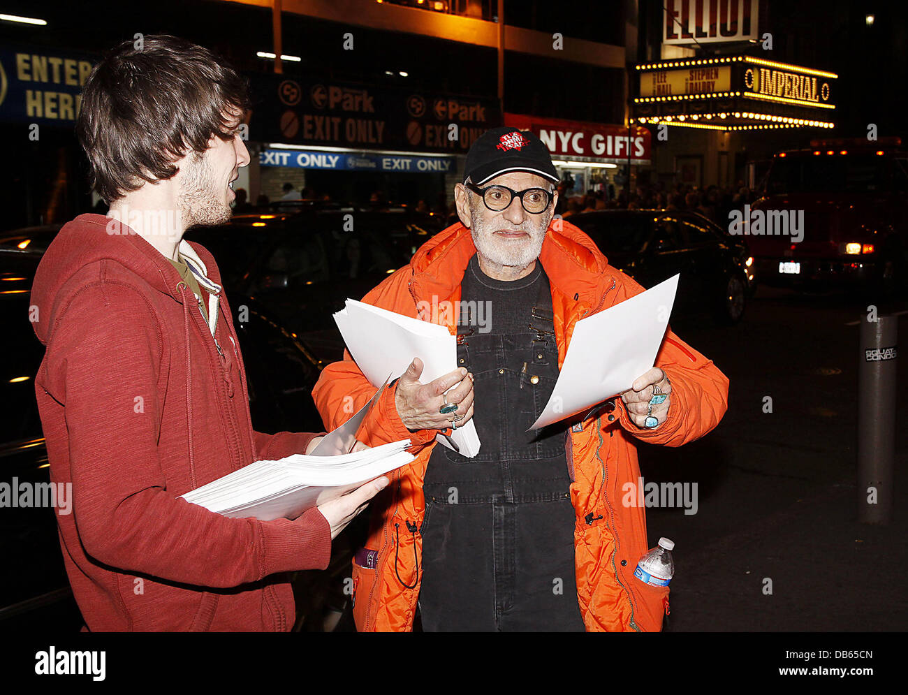 Larry Kramer handing out fliers about AIDS to audience members after a ...