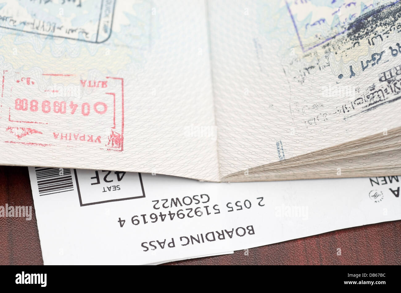 boarding pass and passport stamps Stock Photo - Alamy