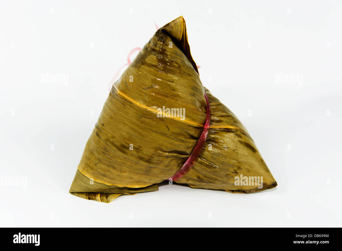 traditional glutonius rice dumpling wrap in leaves Stock Photo - Alamy