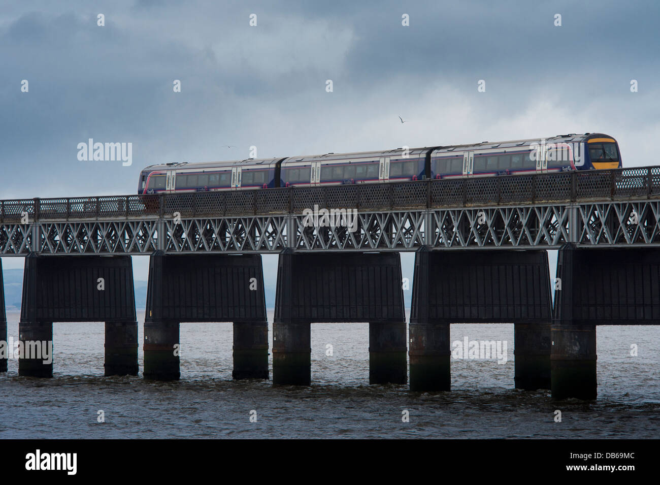 First Scotrail train crossing the iconic Tay Rail Bridge spanning the ...