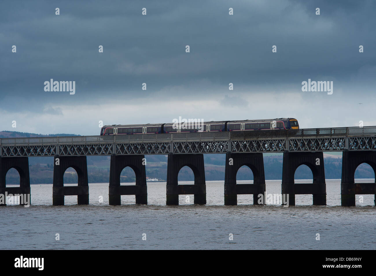 First Scotrail train crossing the iconic Tay Rail Bridge spanning the ...