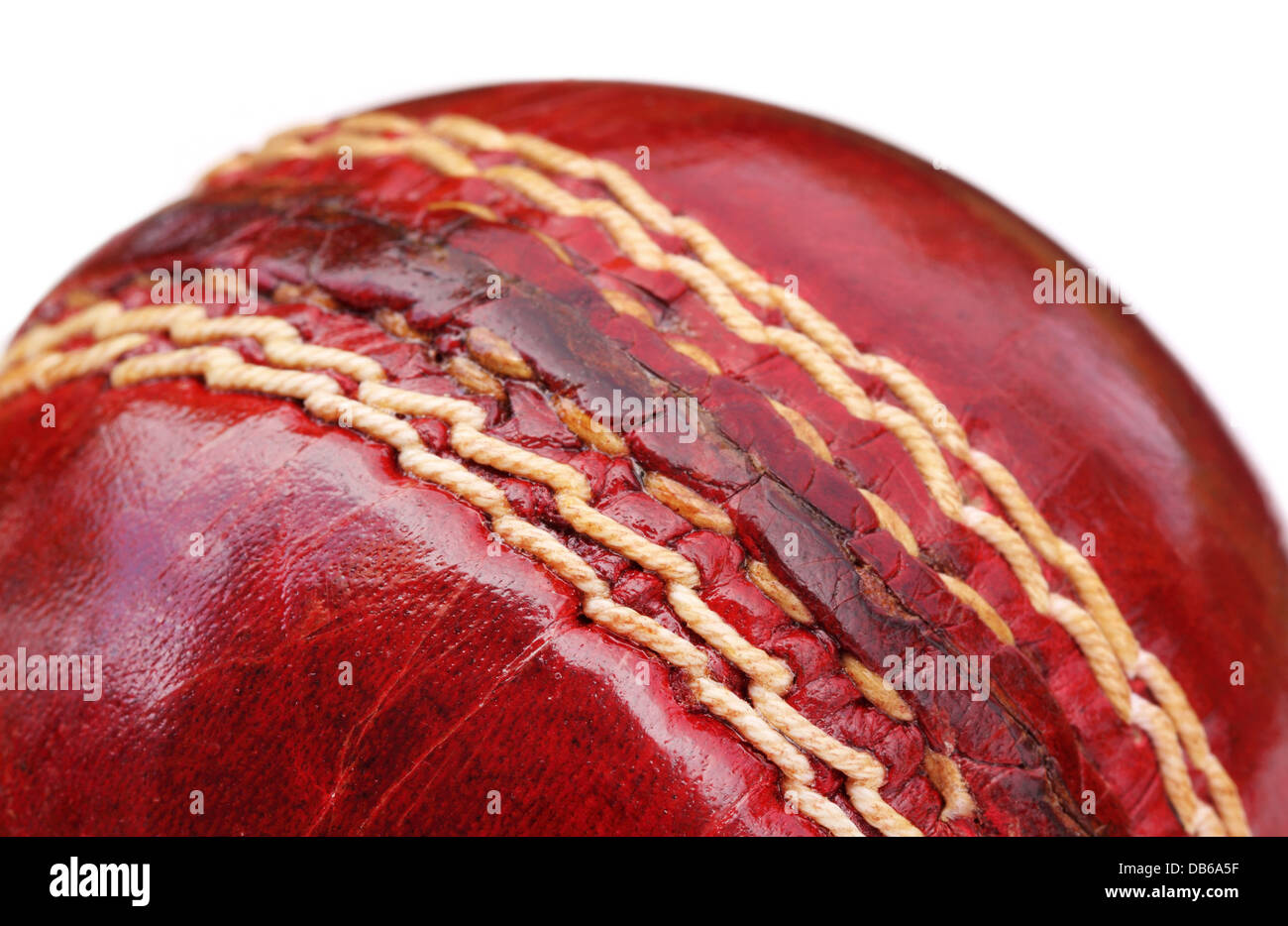 Macro of a cricket ball seam Stock Photo - Alamy