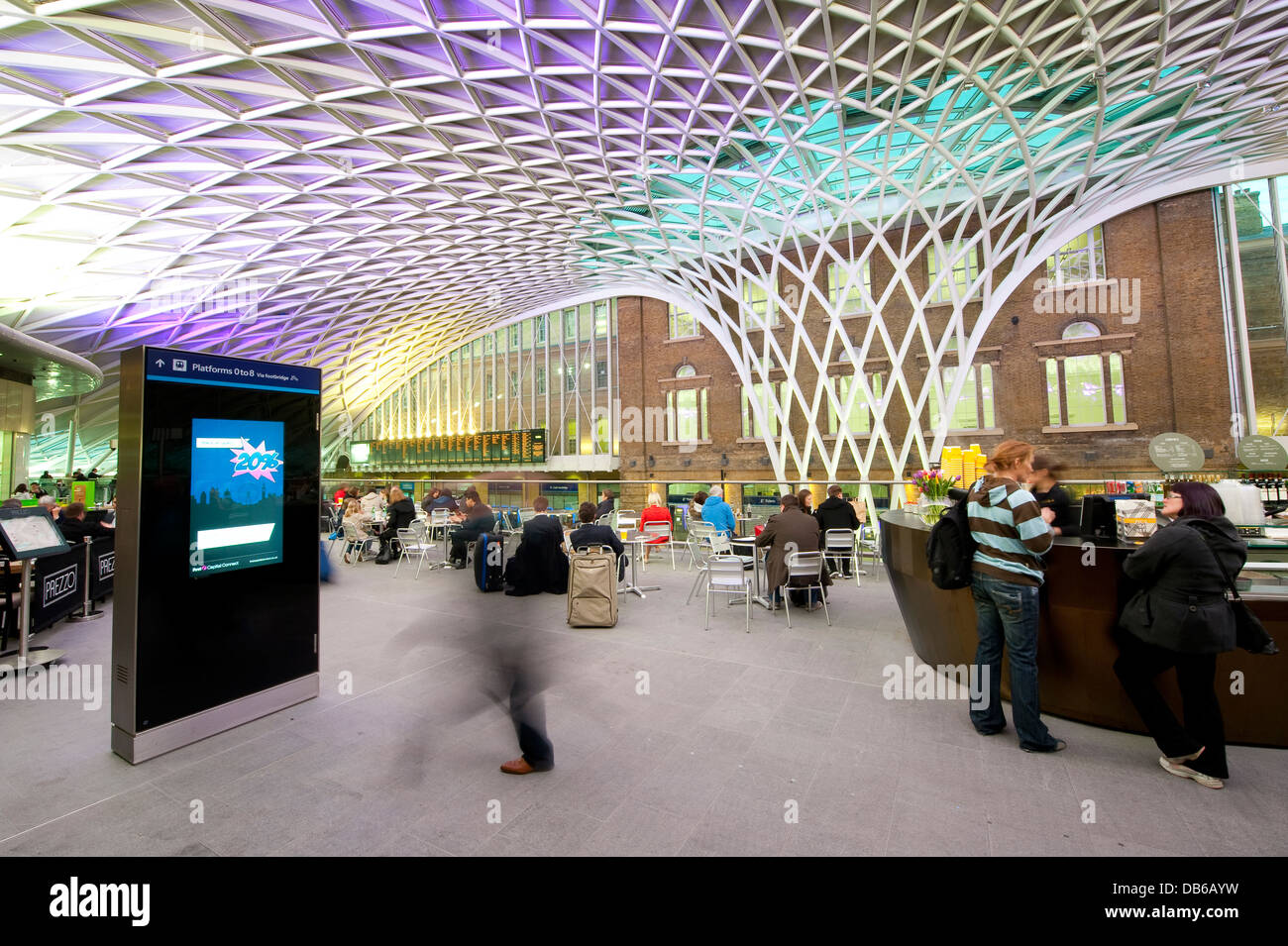 People taking a break in the Western concourse area of Kings Cross ...