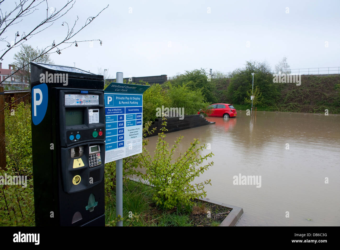 Lone car in a flooded car park in England Stock Photo - Alamy