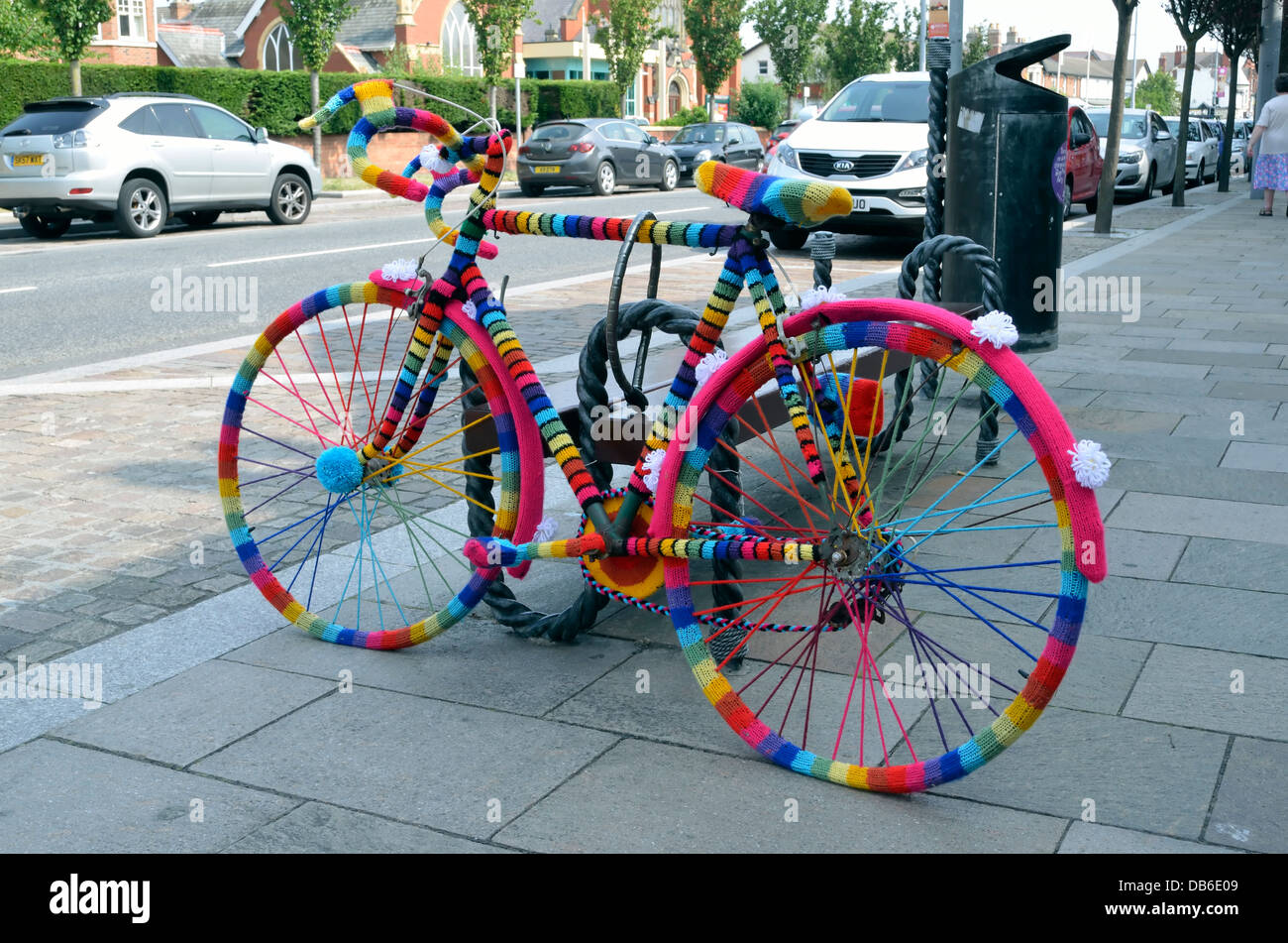 A multi-coloured wrapped bicycle in Hoylake Festival of Firsts Stock ...