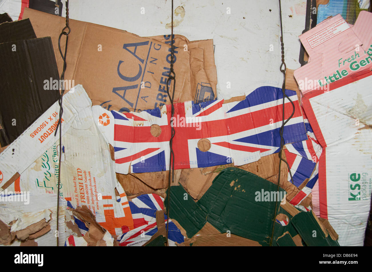 Cardboard that has been compacted in a baling machine Stock Photo - Alamy