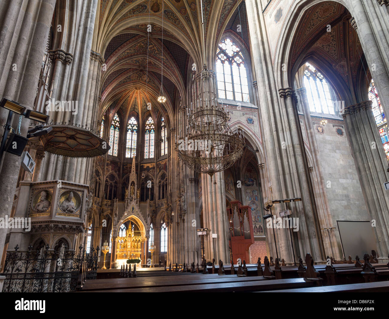 Votive Central Altar and Pulpit. Looking toward the altar framed by a ...