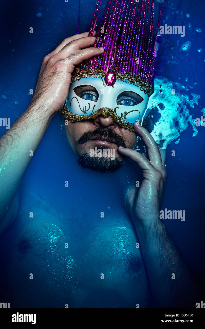 Man with mask, melancholy and suicide, sadness and depression concept ...