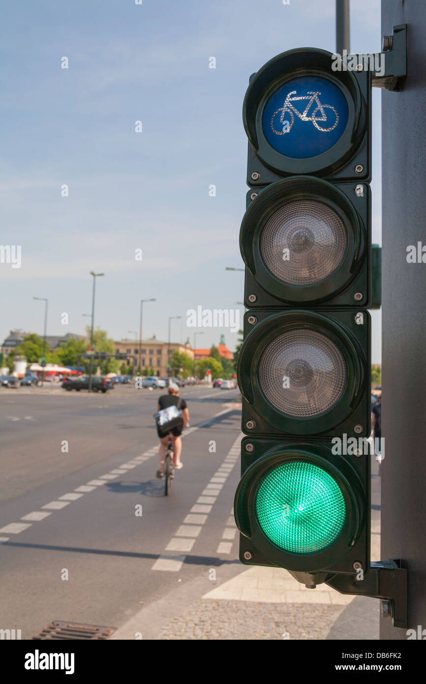 Traffic light for cyclists, bicycle light turns green, a cyclist cross ...