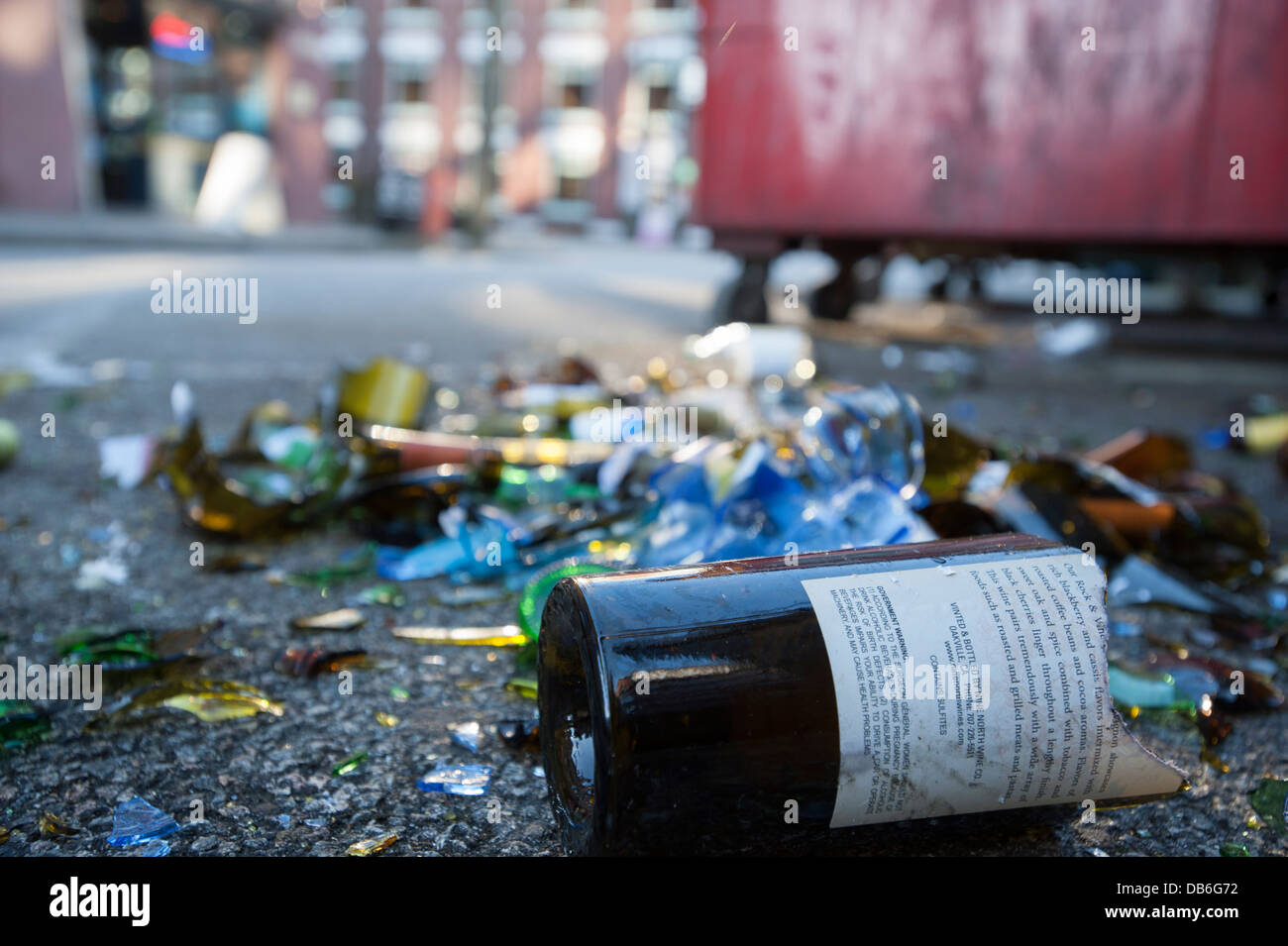 Broken glass littering the street Stock Photo - Alamy