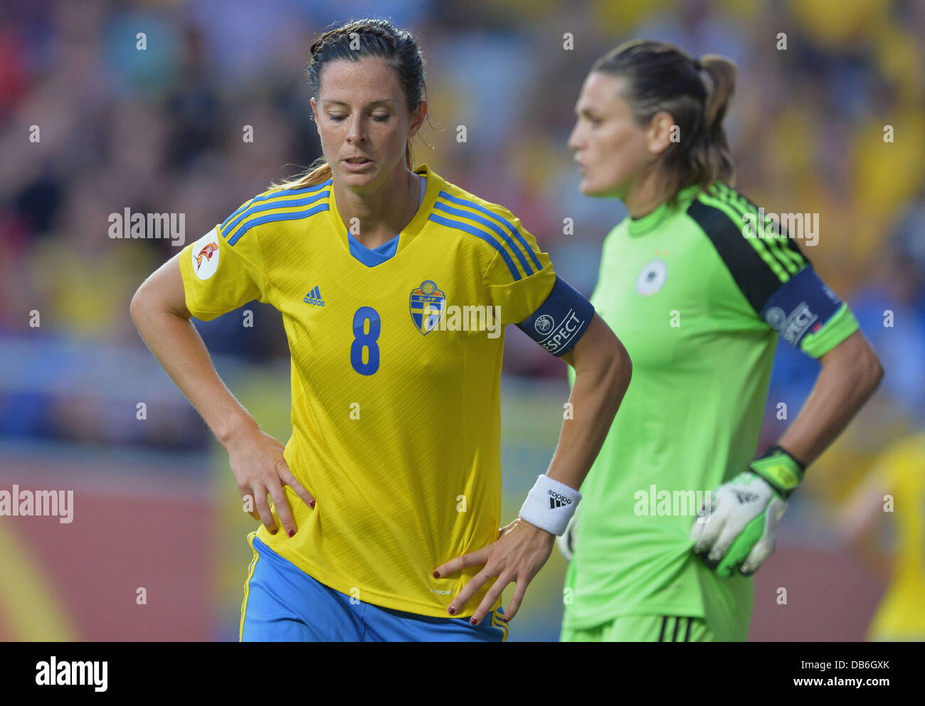 Gothenburg, Sweden. 24th July, 2013. Lotta Schelin (l) of Sweden reacts ...