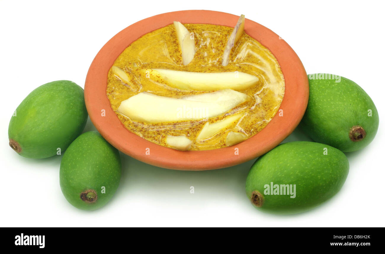 Green mango on kasundi – A Bengali relish Stock Photo - Alamy