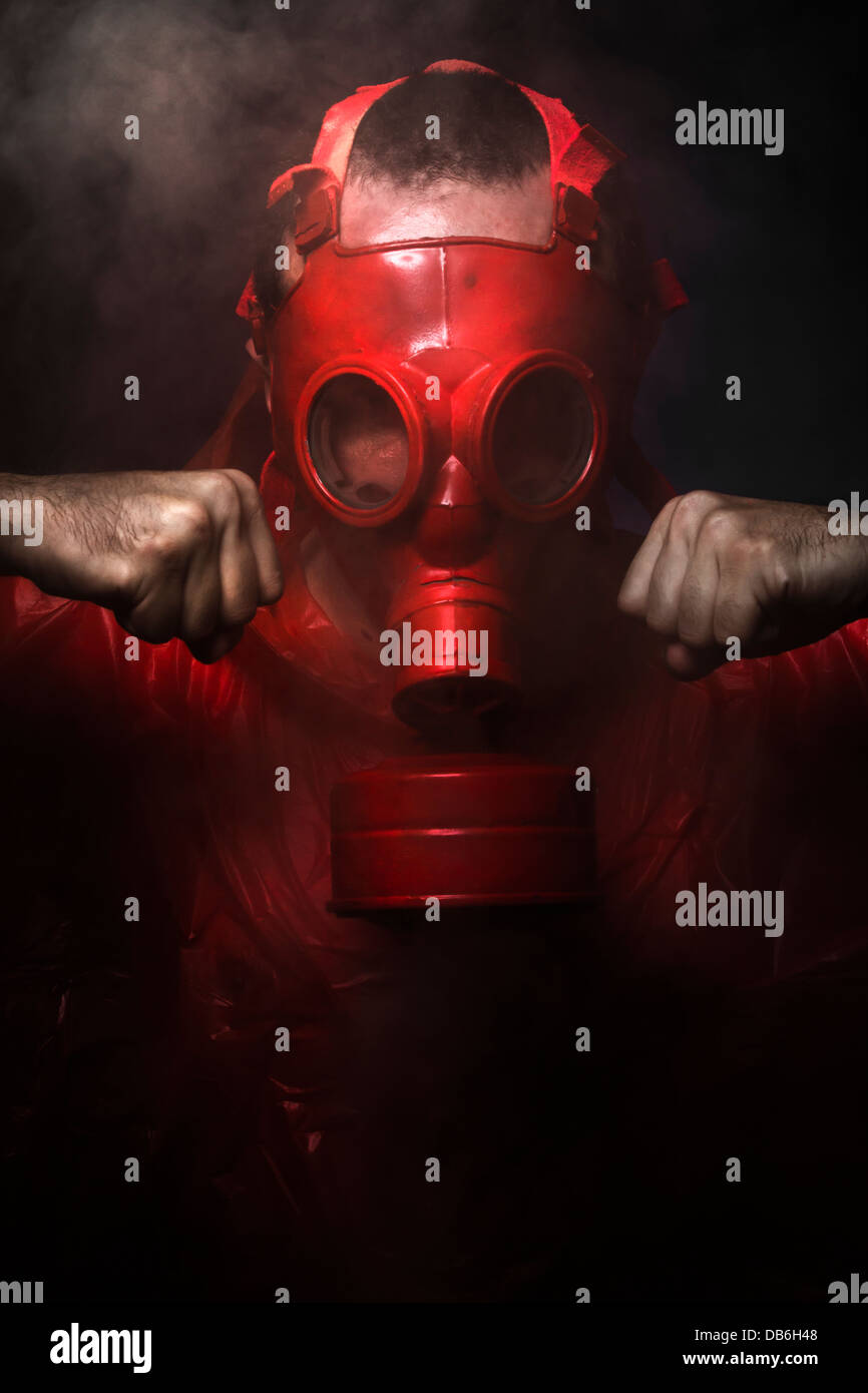 Chemical concept, man with red gas mask Stock Photo - Alamy