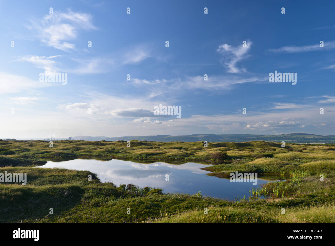 Dune slack pool and coastal dune system at Kenfig Nature Reserve Stock ...