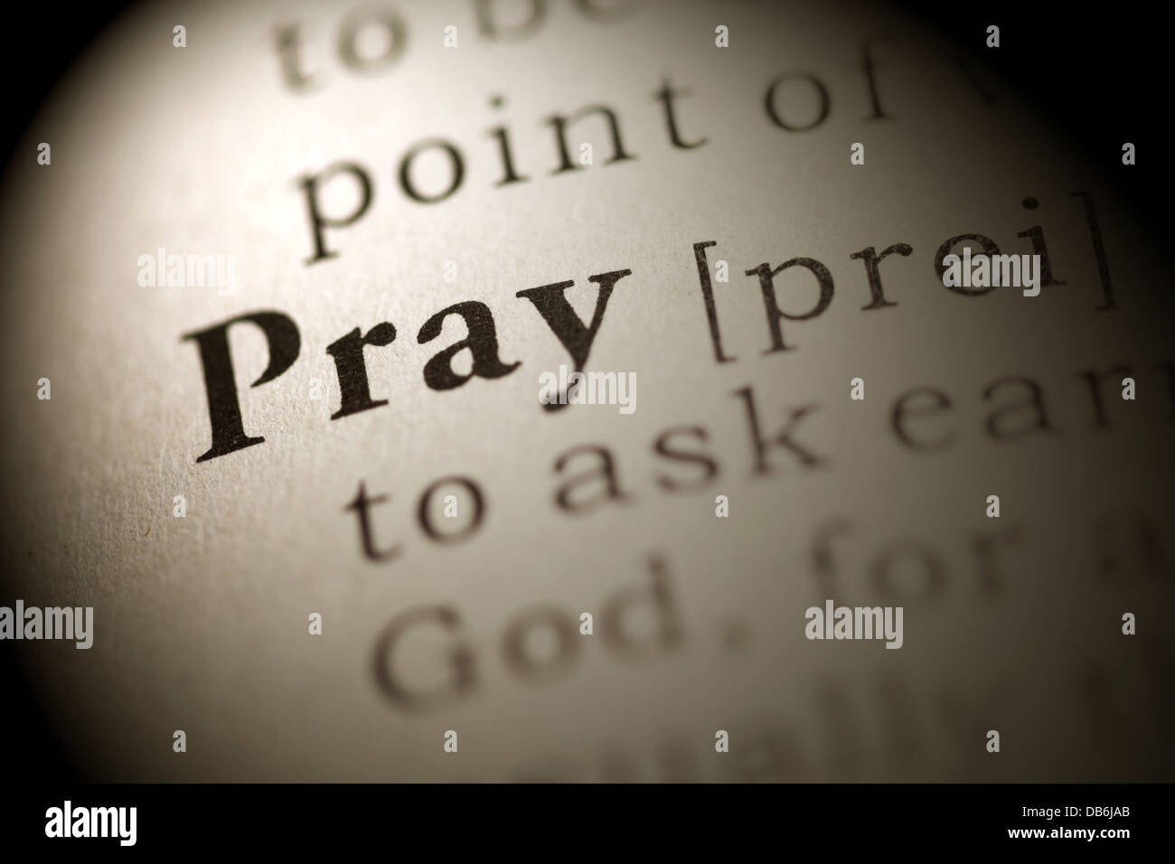 Fake Dictionary, Dictionary definition of the word Pray Stock Photo - Alamy