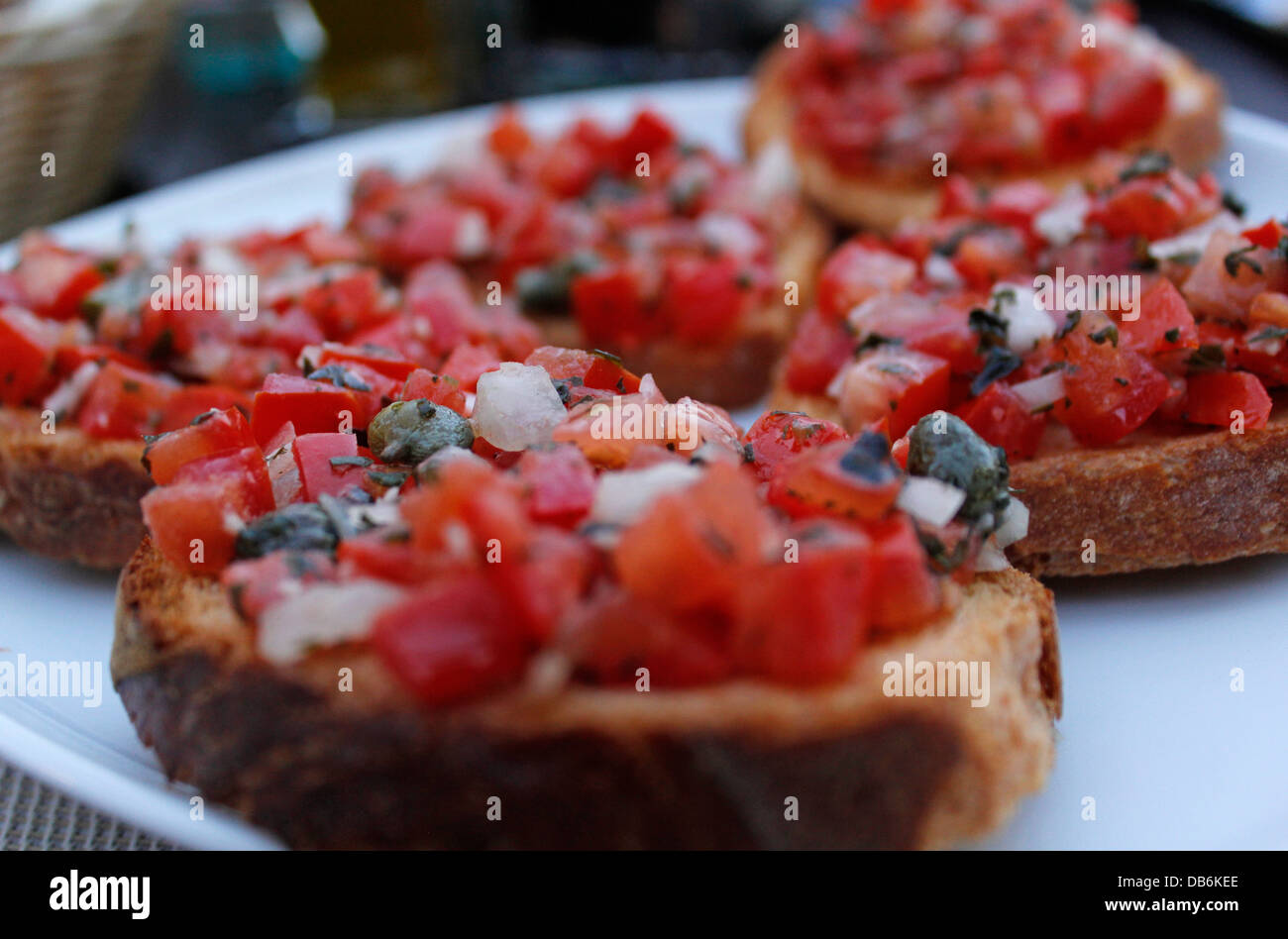 Typical Maltese Hobz Biz-Zejt Toasted bread rubbed with garlic, topped ...