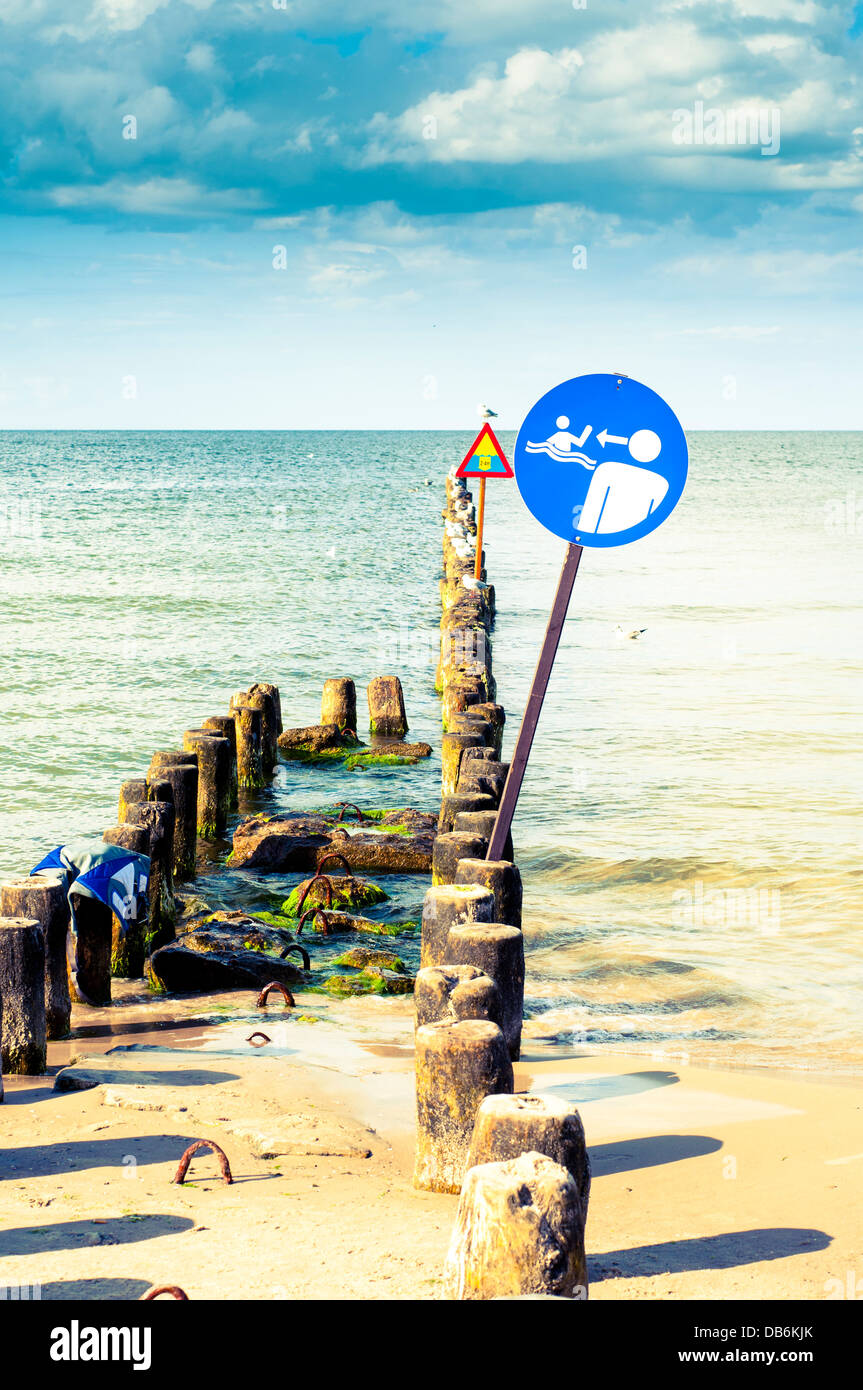 An image of the beach and sign on it Stock Photo - Alamy