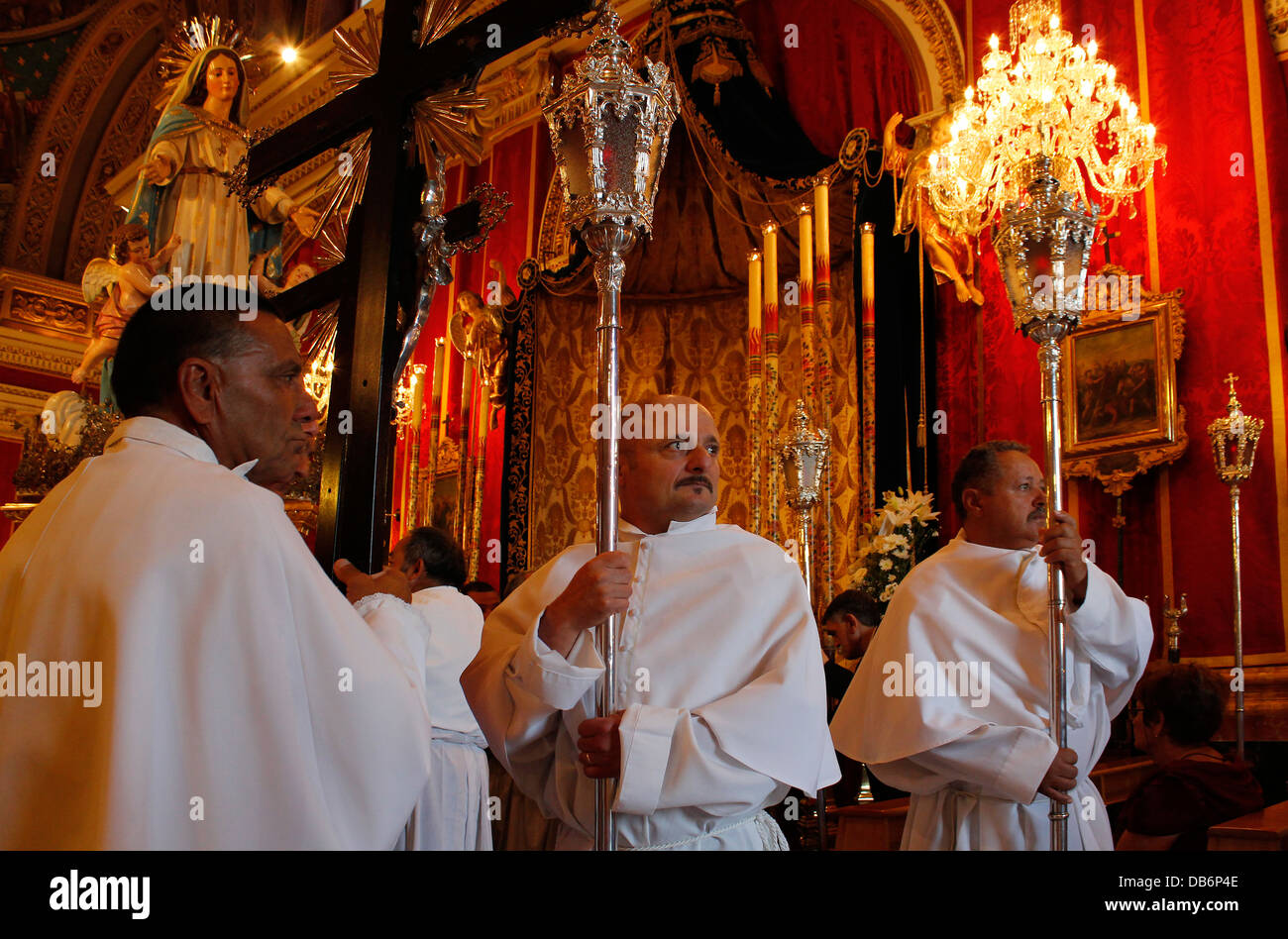 Churchmen inside St Gregory the Great church in the village of Kercem ...