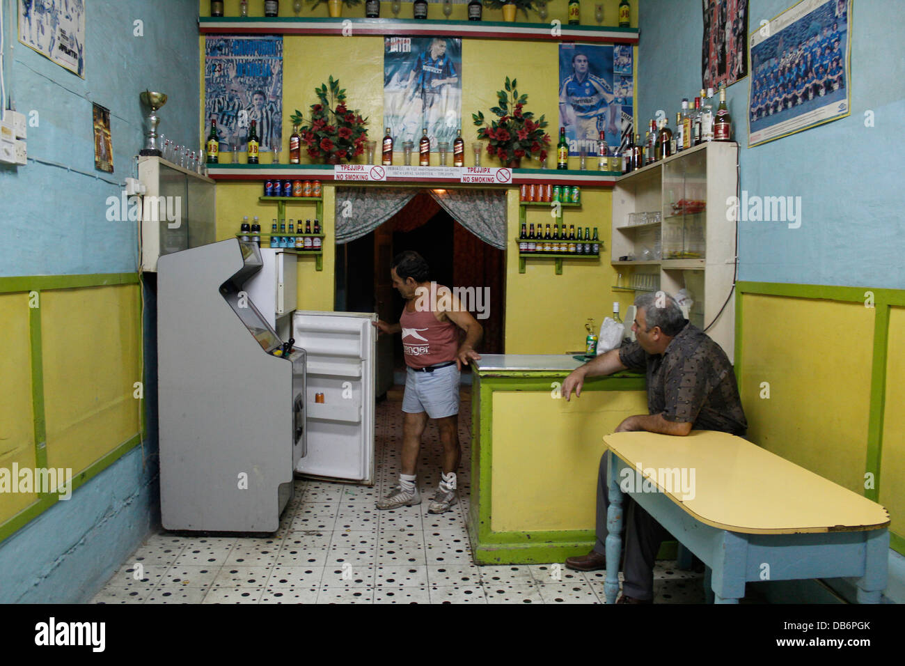 Locals at a small bar in the village of Kercem in the island of Gozo ...