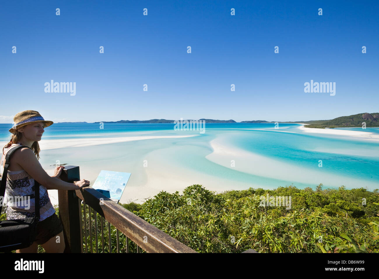 Tourist looking out over Hill Inlet and Whitehaven Beach from Stock ...
