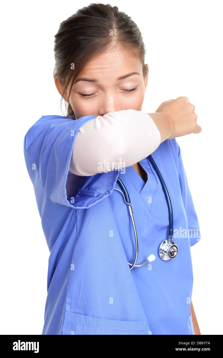 Sneezing woman medical nurse or doctor doing elbow sneeze being sick ...