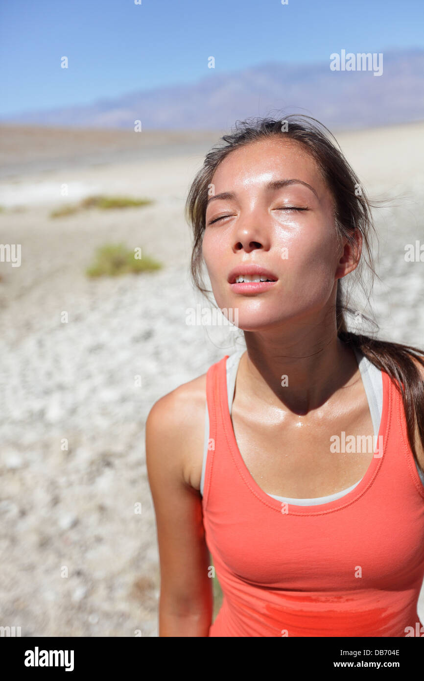 Thirst - dehydrated thirsty woman sweating in Death Valley desert, USA ...