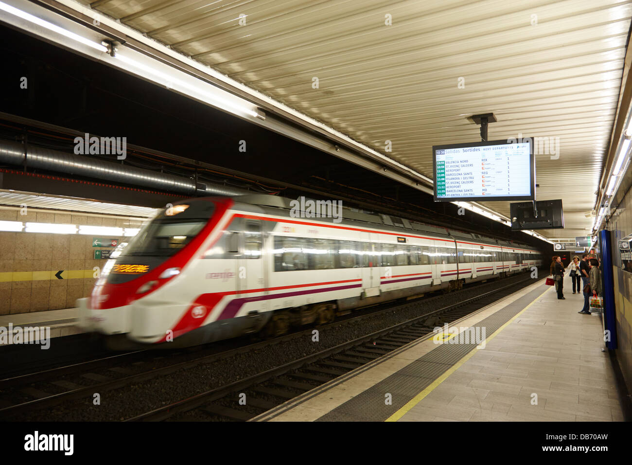 Train speeding through station hi-res stock photography and images - Alamy