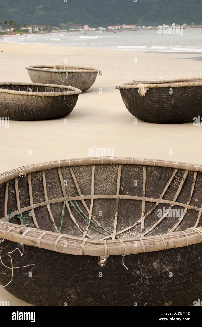 Vietnam, Da Nang. Bac My An beach, traditional tiny round bamboo ...