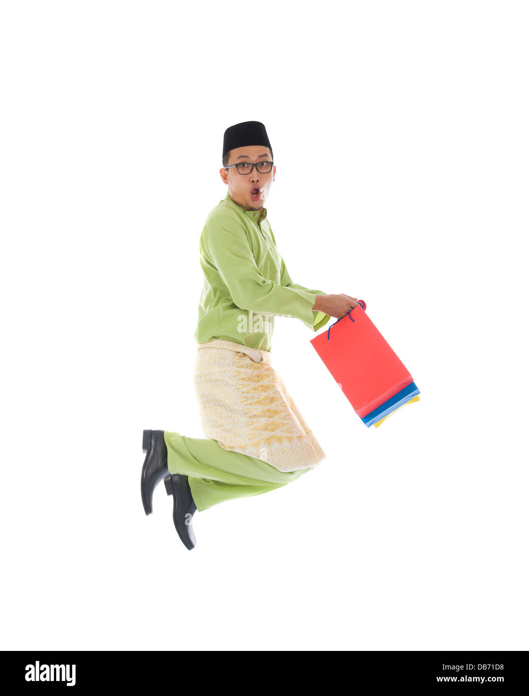 indonesian male shopping and jumping in joy during hari raya ramadan ...