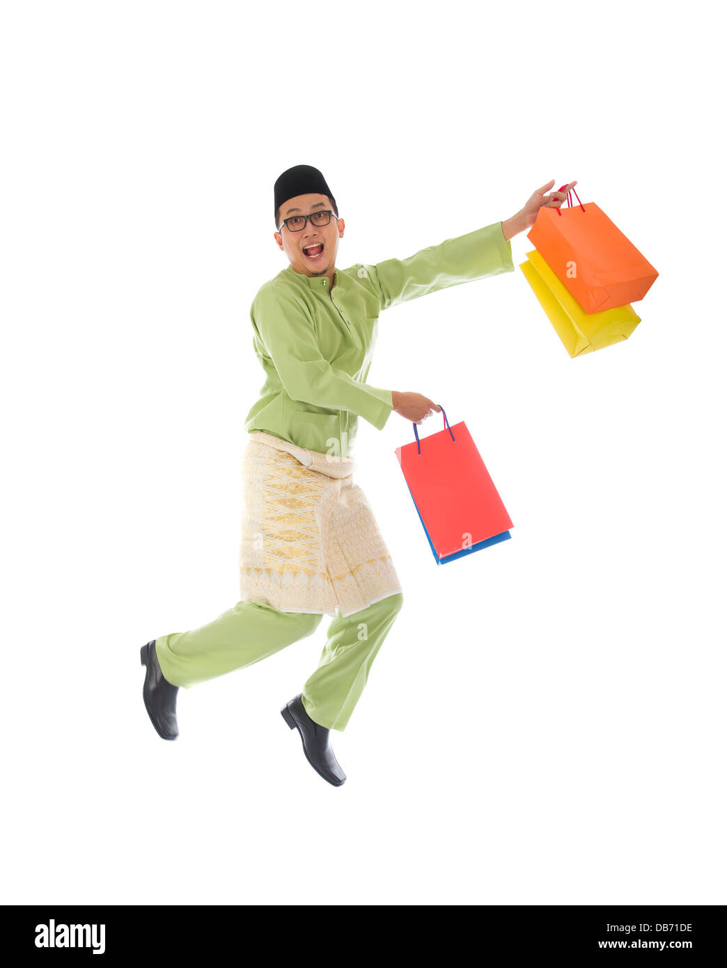 indonesian male shopping and jumping in joy during hari raya ramadan ...