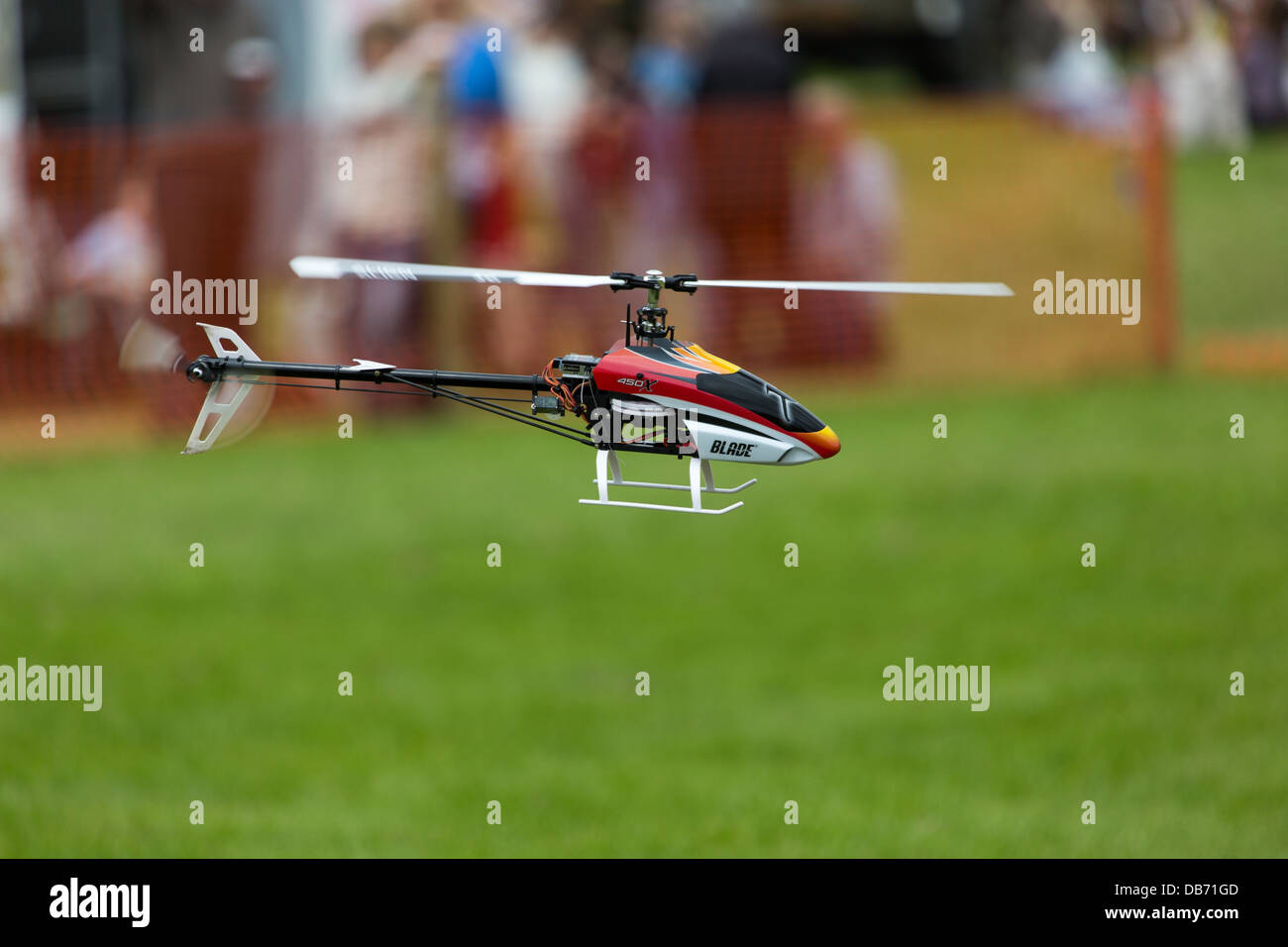 A remote controlled model helicopters carrying out an aerobatic display ...