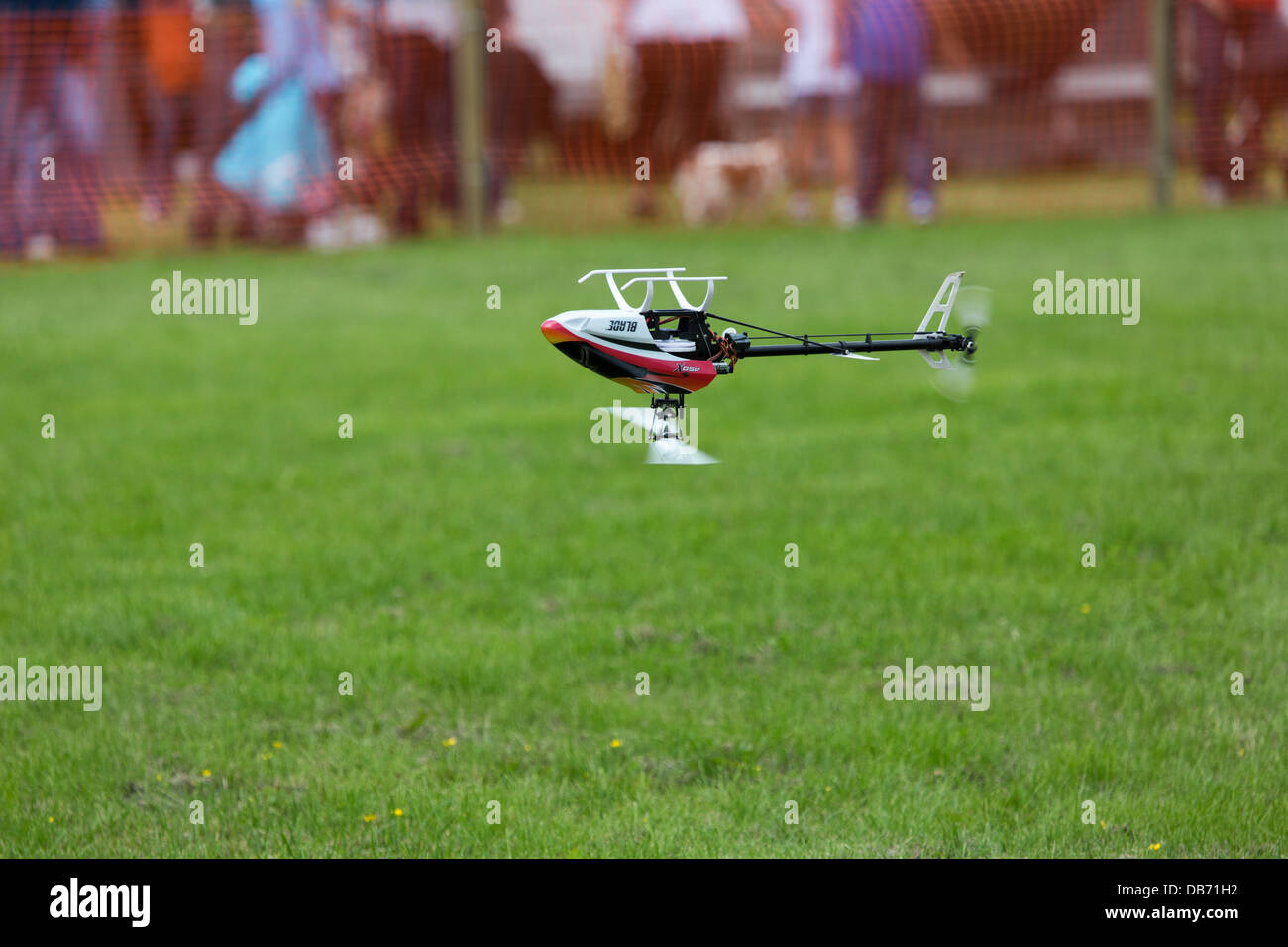 A remote controlled model helicopters carrying out an aerobatic display ...