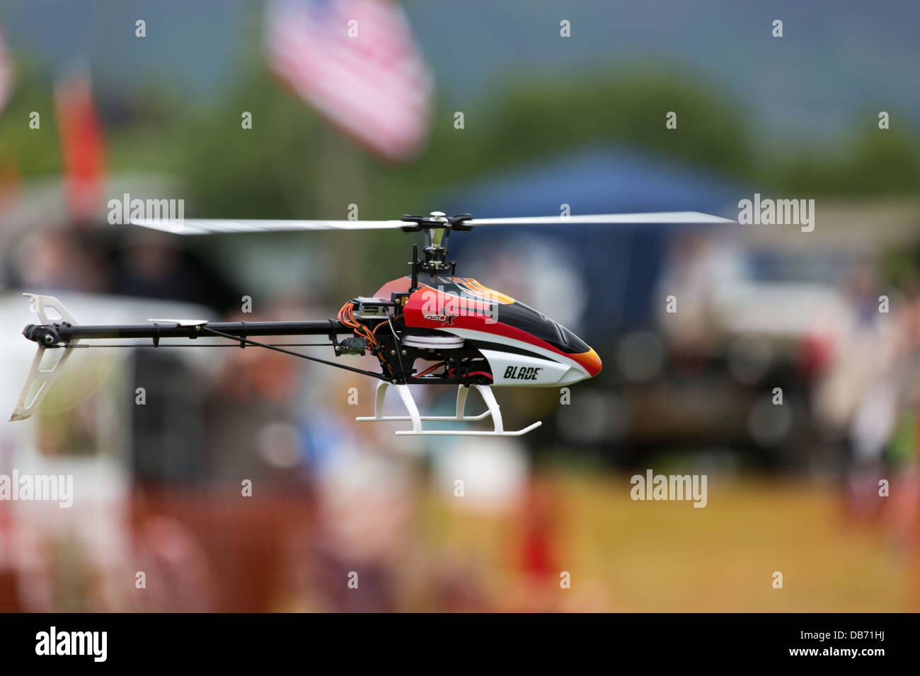 A remote controlled model helicopters carrying out an aerobatic display ...