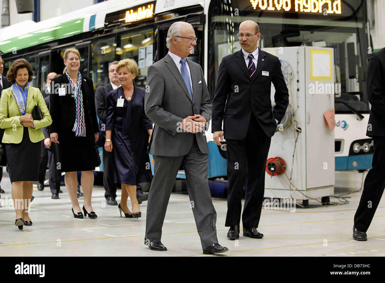 King Carl Gustav and Queen Silvia visit Volvo's factory during their ...