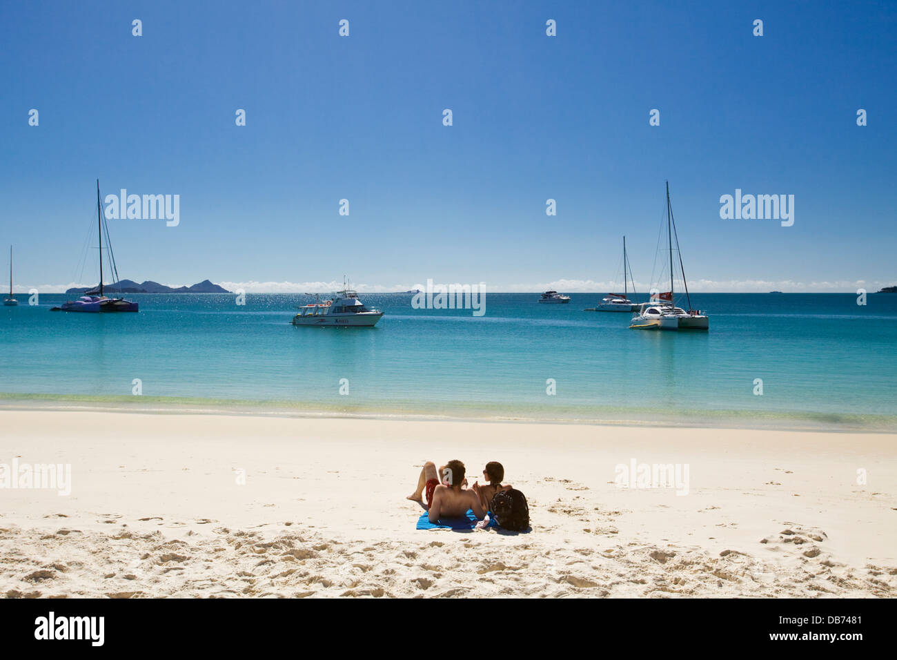 Old couple sunbathing hi-res stock photography and images - Alamy
