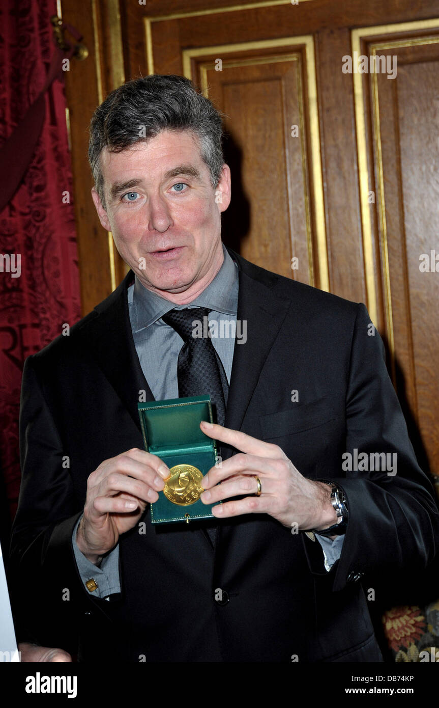 US novelist Jay McInerney poses after being awarded the Vermeil medal ...