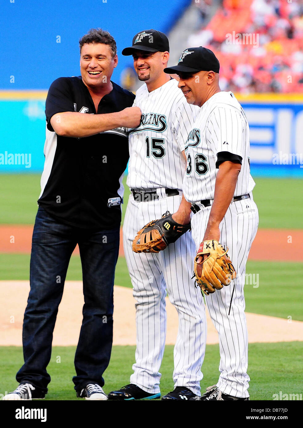 Steven Bauer (L) throw the first pitch during the Florida Marlins Vs ...