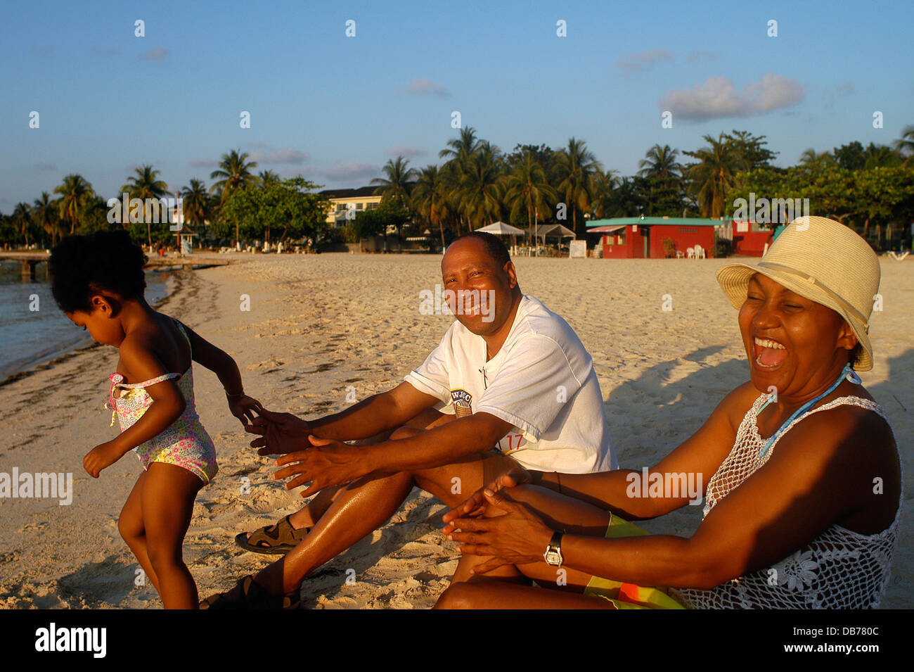 Family at the beach of Ocho Rios, Jamaica, Caribbean Sea Stock Photo ...