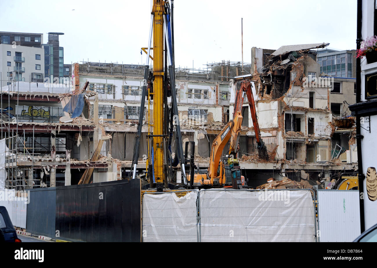 Brighton UK 24 July 2013 - Behind the facade demolition work goes on at ...